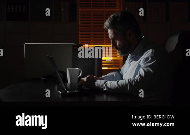 Night office failure worries businessman. Night office concentration on ...