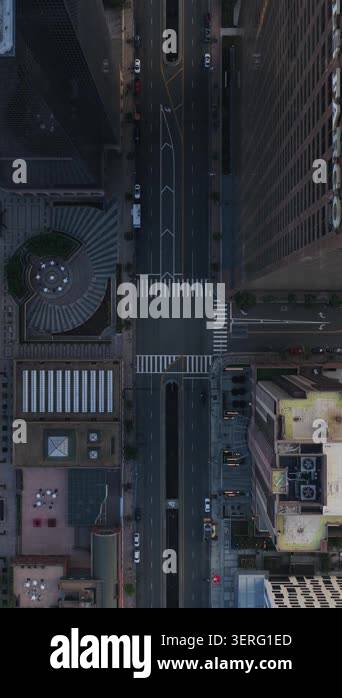 Flying over Los Angeles downtown skyscrapers top down revealing ...