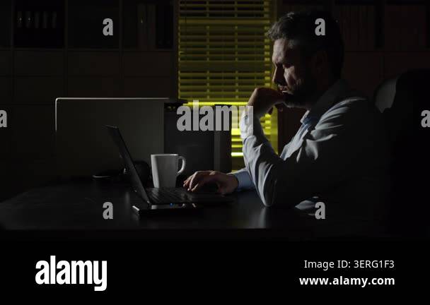 Overworked office worker stressed by overtime. Overworked businessman ...