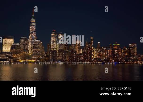 New York City skyline. NYC Manhattan glowing at night. New York with ...