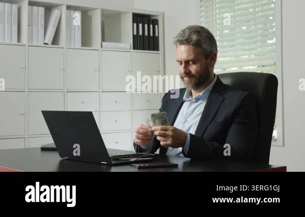 Man counting money during accounting work. Office worker counting money ...
