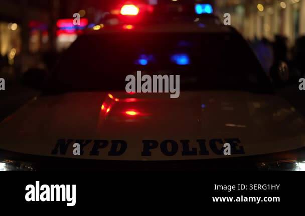 NYPD police lights on Ne York city night bokeh. Blurred NYPD police in ...