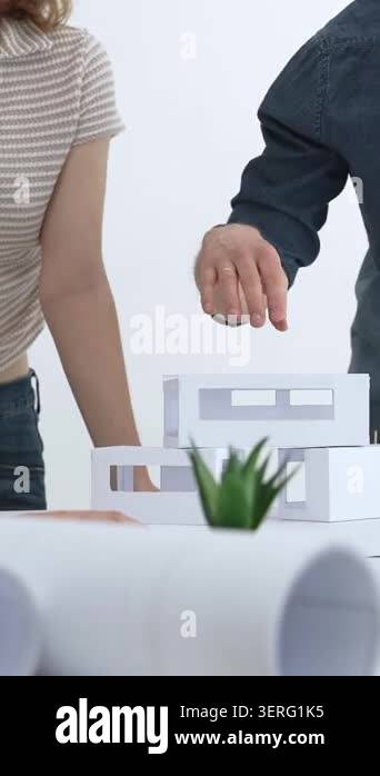 Architects collaborating on an innovative urban planning and building ...