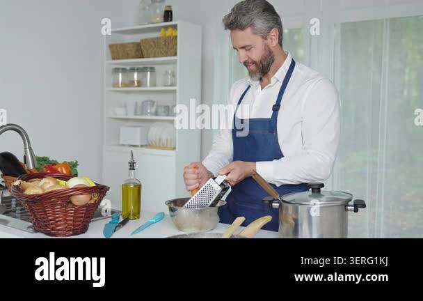 A chef cooking fresh vegetables. A man cooking a homemade meal. A cook ...