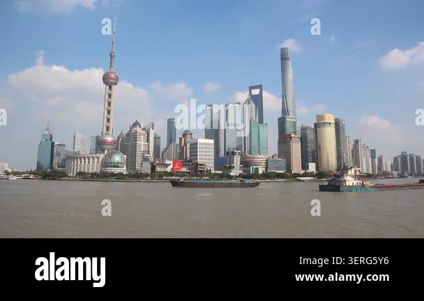 Wide shot of Shanghai skyline with Oriental Pearl Tower and Shanghai ...