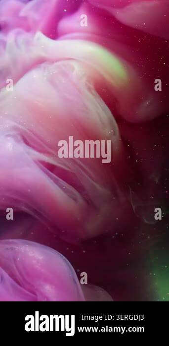 Vertical video. Glitter mix. Ink splash. Defocused pink purple green ...