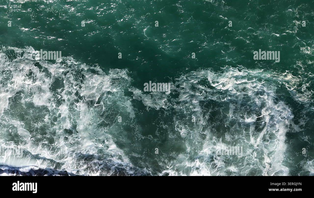 Aerial View Of Ocean Waves Crashing Onto Sandy Beach Stock Video ...
