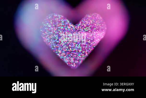 Heart sequins. Blur love shape. Defocused neon purple green multicolor ...