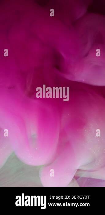 Vertical video. Underwater mist. Splash art. Blur pink green purple ...