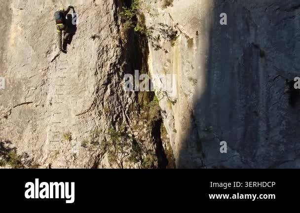 people climbing on the steep mountain Stock Video Footage - Alamy