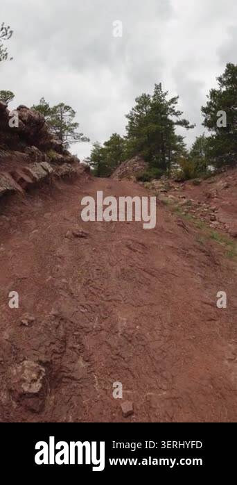 Dramatic Mountain Path Leading Through Red Rocks Stock Video Footage ...