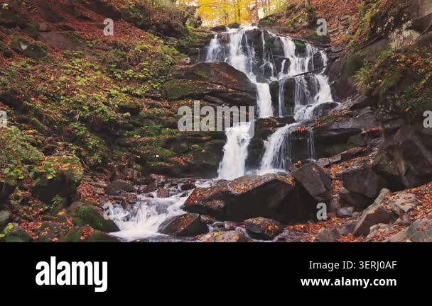 Realtime 4K static video waterfall stream falling down rocks and stones ...