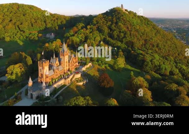 Aerial shot of the castle Drachenburg Siebengebirge at sunset near Bonn ...
