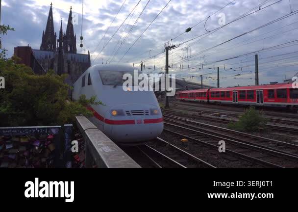 The Fast speed ICE Train moves by tht Hohenzollern Bridge in Cologne ...