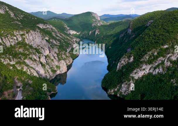 Aerial panorama of the Drina River canyon surrounded by steep rocky ...