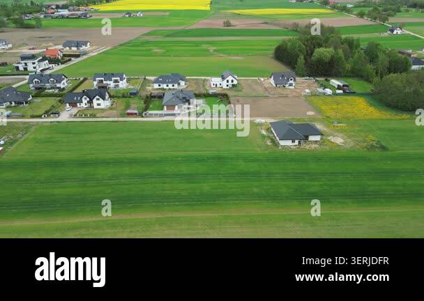 Aerial View of Residential Area and Roads in Countryside 4K ProRes ...