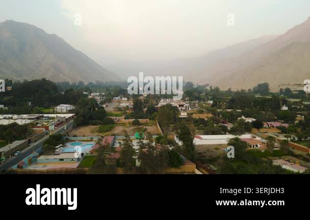 4K Aerial perspective of Cieneguilla valley in Lima, showing high-end ...