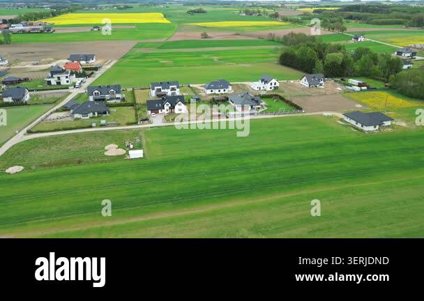 Aerial View of Residential Area and Roads in Countryside 4K ProRes ...
