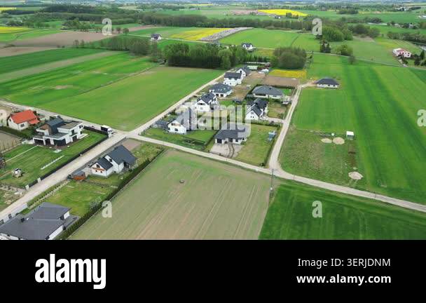 Aerial View of Residential Area and Roads in Countryside 4K ProRes ...