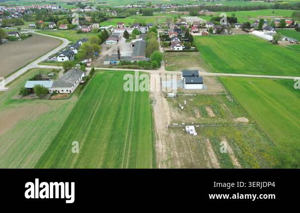 Aerial View of Residential Area and Roads in Countryside 4K ProRes ...