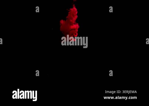 red smoke on black background Stock Video Footage - Alamy