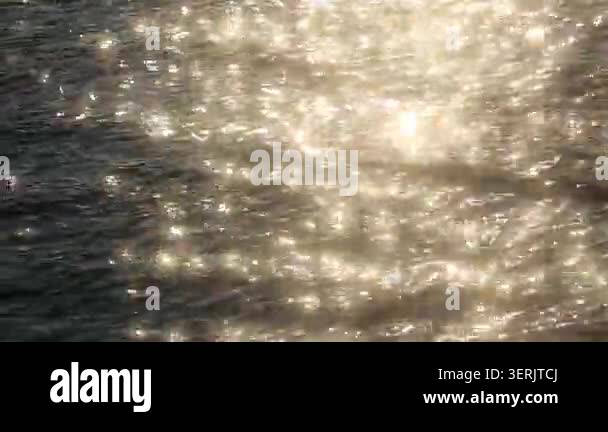 Golden sparkling water surface ideal for small business spa and ...