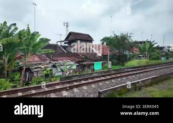 Train ride through landscapes on Java Island Stock Video Footage - Alamy