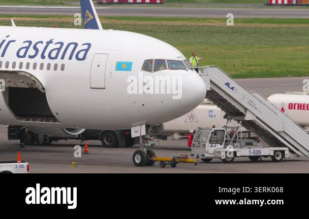 ALMATY, KAZAKHSTAN - MAY 10, 2024: The captain of an Air Astana Boeing ...