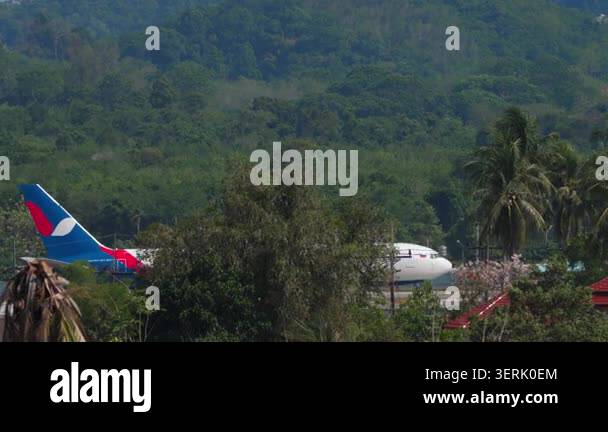 PHUKET, THAILAND - MARCH 23, 2026: An Azur Air Boeing 767-300 with ...