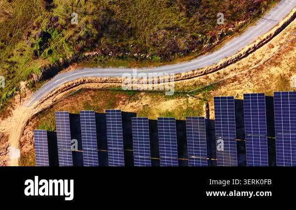 Solar panel modules on green grass from directly above. Straight down ...
