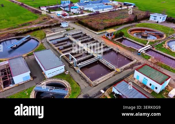 Aerial view of full wastewater treatment complex near agricultural ...