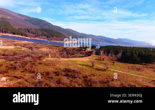 Solar farm in mountain valley landscape, Bulgaria. Elevated drone view ...