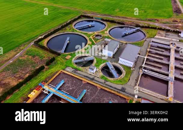 Aerial view of circular clarifier basins at wastewater treatment plant ...