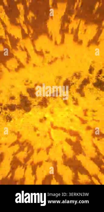 A seamless looping 3D animation featuring an abstract metallic canyon ...