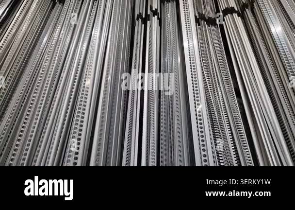 Various types of aluminum profiles (angular, T-shaped) on the shelf of ...