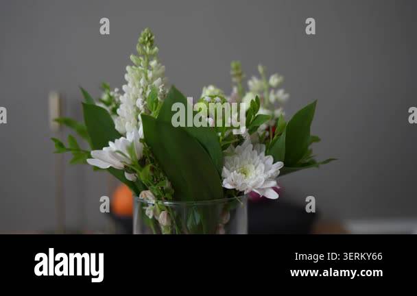 Elegant combination of small white blossoms and tall matching flower ...