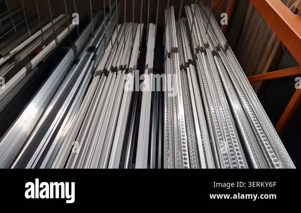 Various types of aluminum profiles (angular, T-shaped) on the shelf of ...