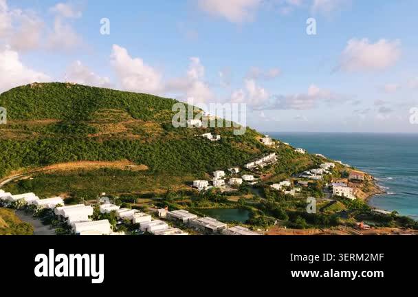 Aerial view of Saint Martin island in the Caribbean Sea. Green tropical ...