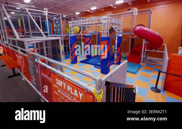 Indoor trampoline park, enjoying active recreation on the trampoline ...