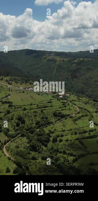 Mountain Top Villages, drone view of green plains, carbon footprint and ...