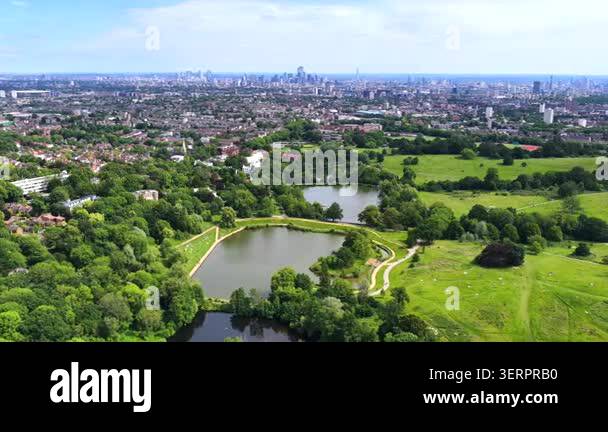 Hampstead Heath Swimming Ponds and London Skyline Aerial 4K Stock Video ...