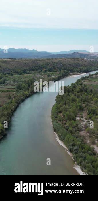 Drone view of the Neretva river flowing across the bosnian river ...