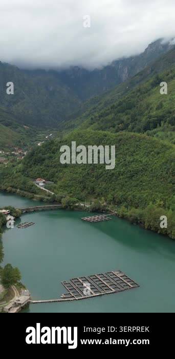 Aerial drone view of river neretva flowing through mountains view of ...