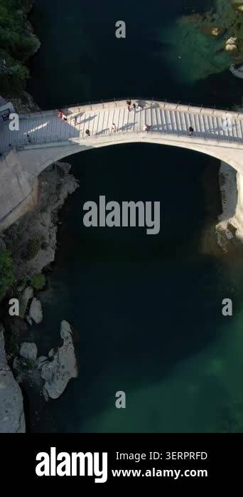 Drone view of Mostar Bridge in the Balkans, an example of ottoman ...