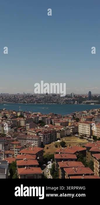 Overhead view of the city with a coast to the sea, drone footage of ...