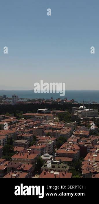 Aerial view of the city built by the sea, side by side houses, orderly ...