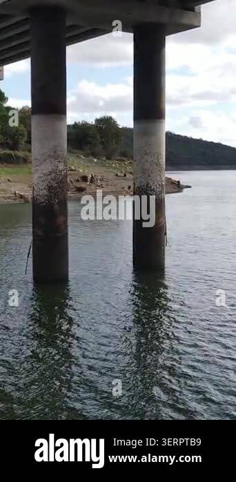 Lake barrage dam flume water aerial view, bridge over pond dam, puddle ...