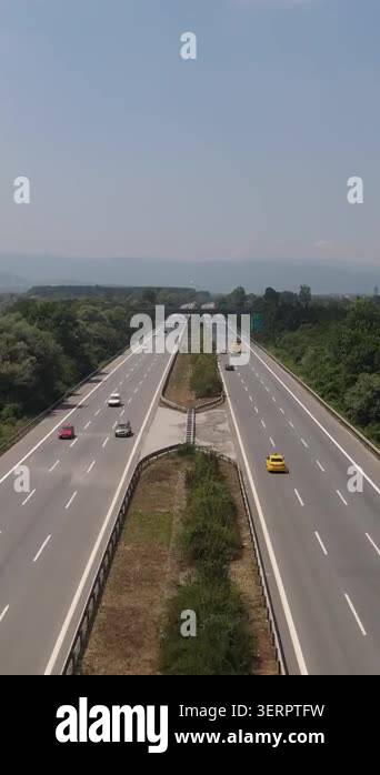 Time-lapse of asphalt road with the rural area on both sides, the ...