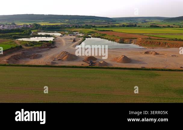 Industrial aerial view of a gravel processing plant with conveyor belts ...
