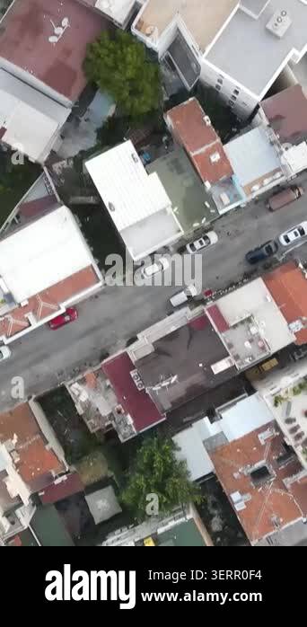 Aerial view of buildings and streets in between, overhead drone view of ...